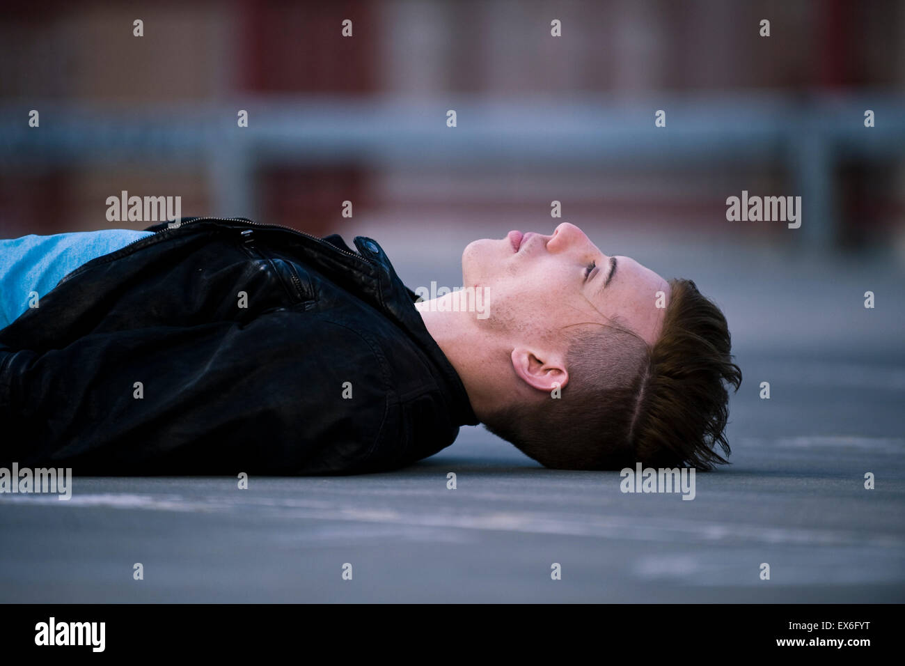 Man Lying On Ground High Resolution Stock Photography and Images - Alamy