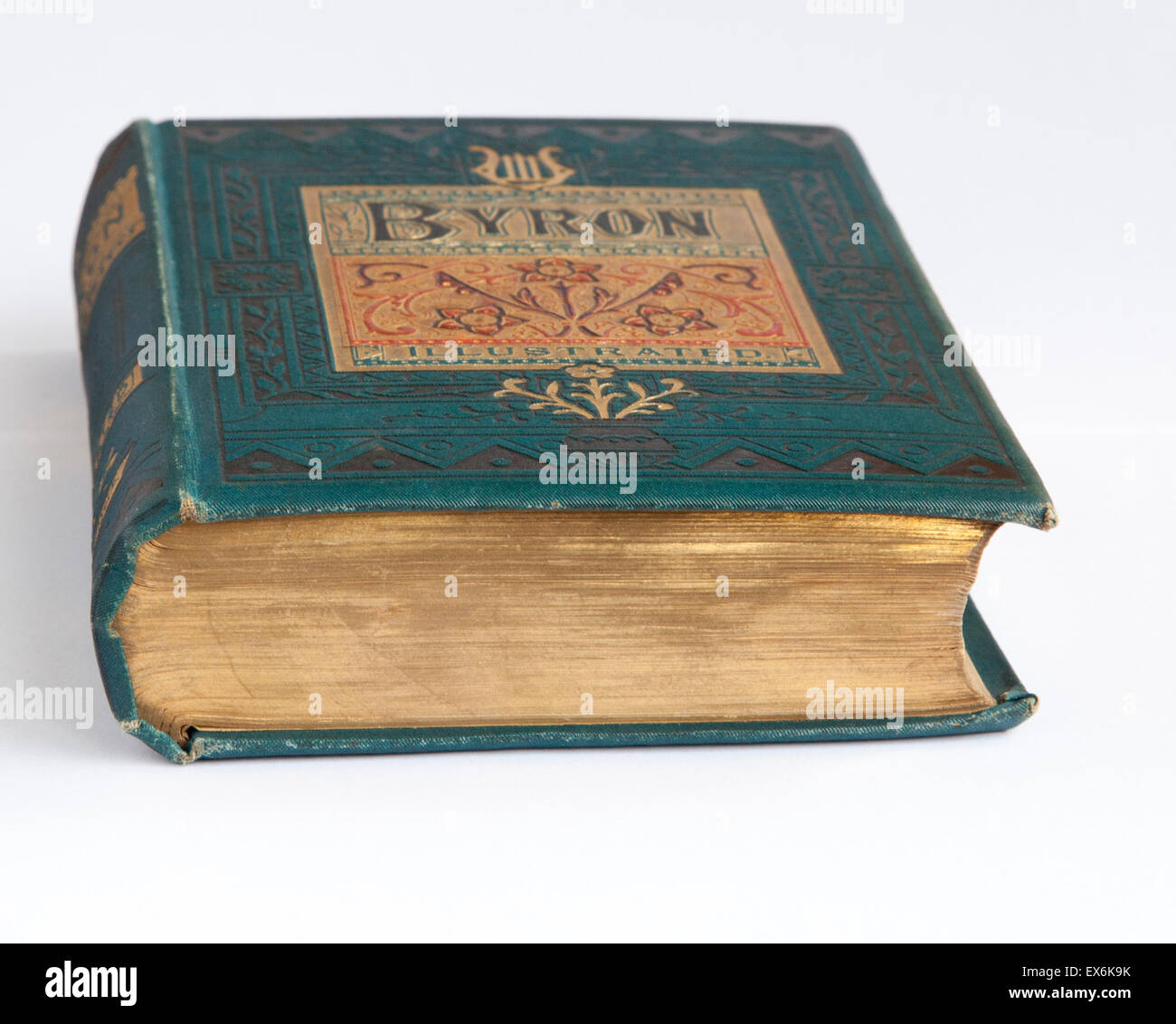 book with metal guilded pages. In image EX6K9G sunlight speckles are ...