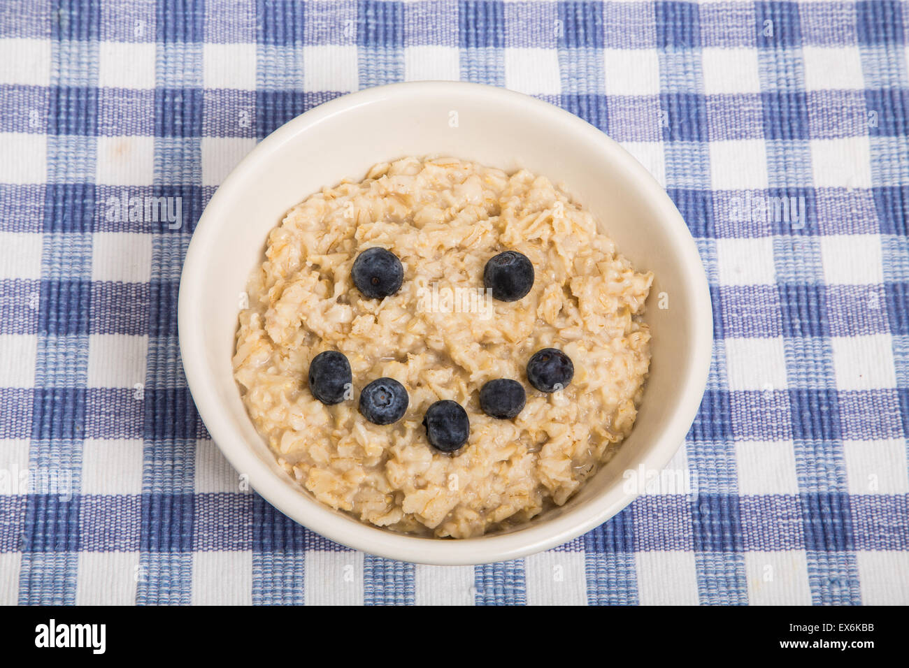 A bowl of hot, fresh cooked oatmeal Stock Photo - Alamy