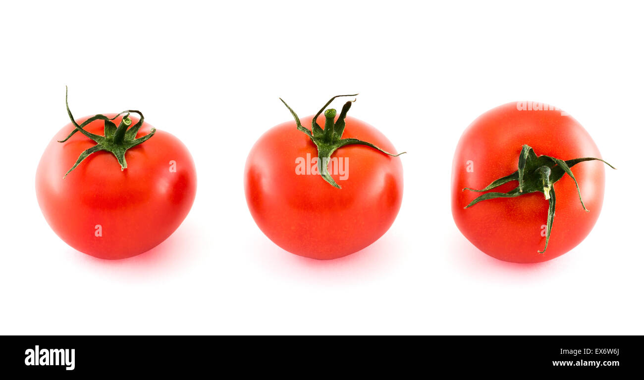 Three fresh tomatos isolated over white Stock Photo - Alamy