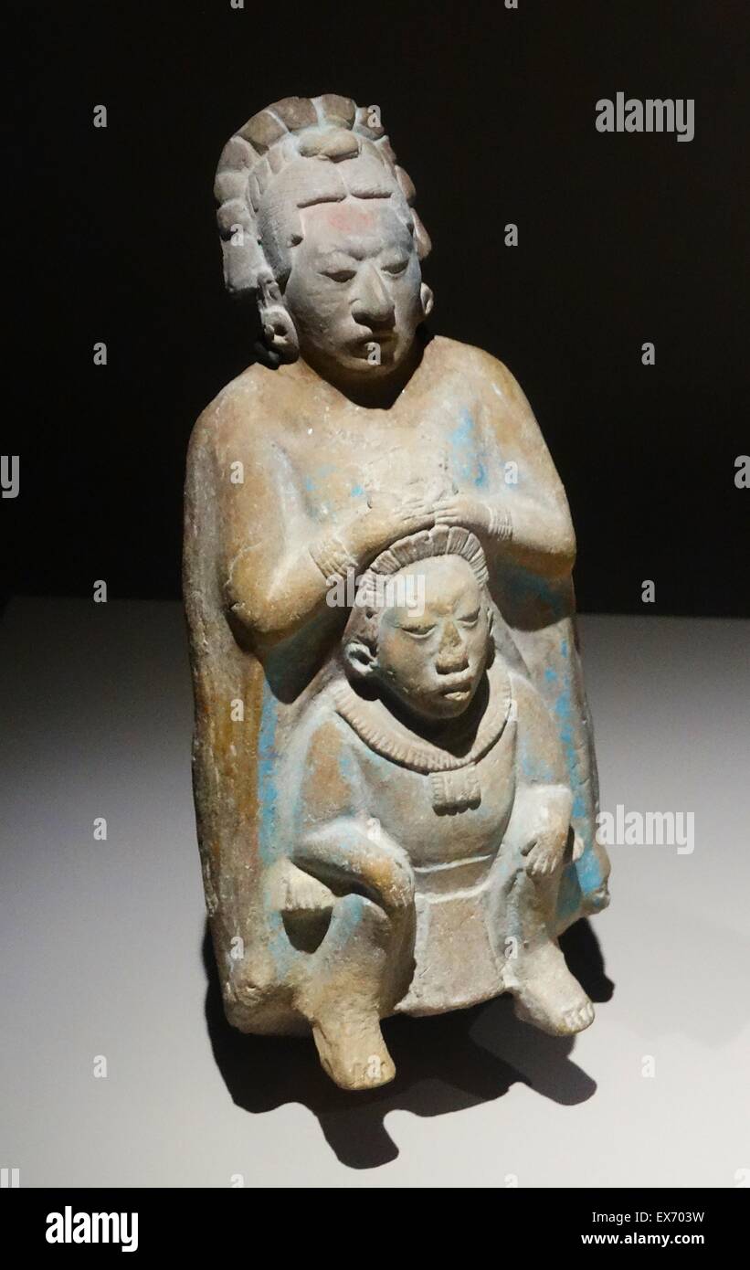 Mayan ceramic figurine of a noblewoman with an elaborate hairstyle ...