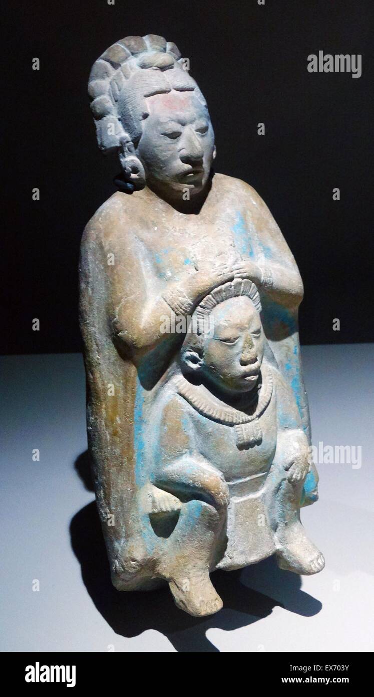 Mayan ceramic figurine of a noblewoman with an elaborate hairstyle ...