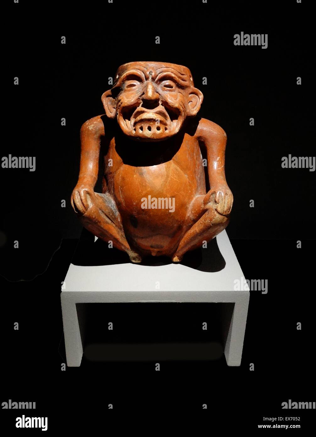 Mayan ceramic anthropomorphic pot, depicting an old man seated with his ...