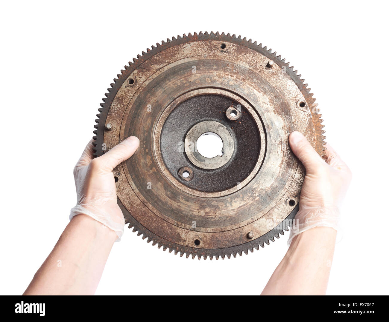 Worker's male hands holding engine's fragment Stock Photo - Alamy