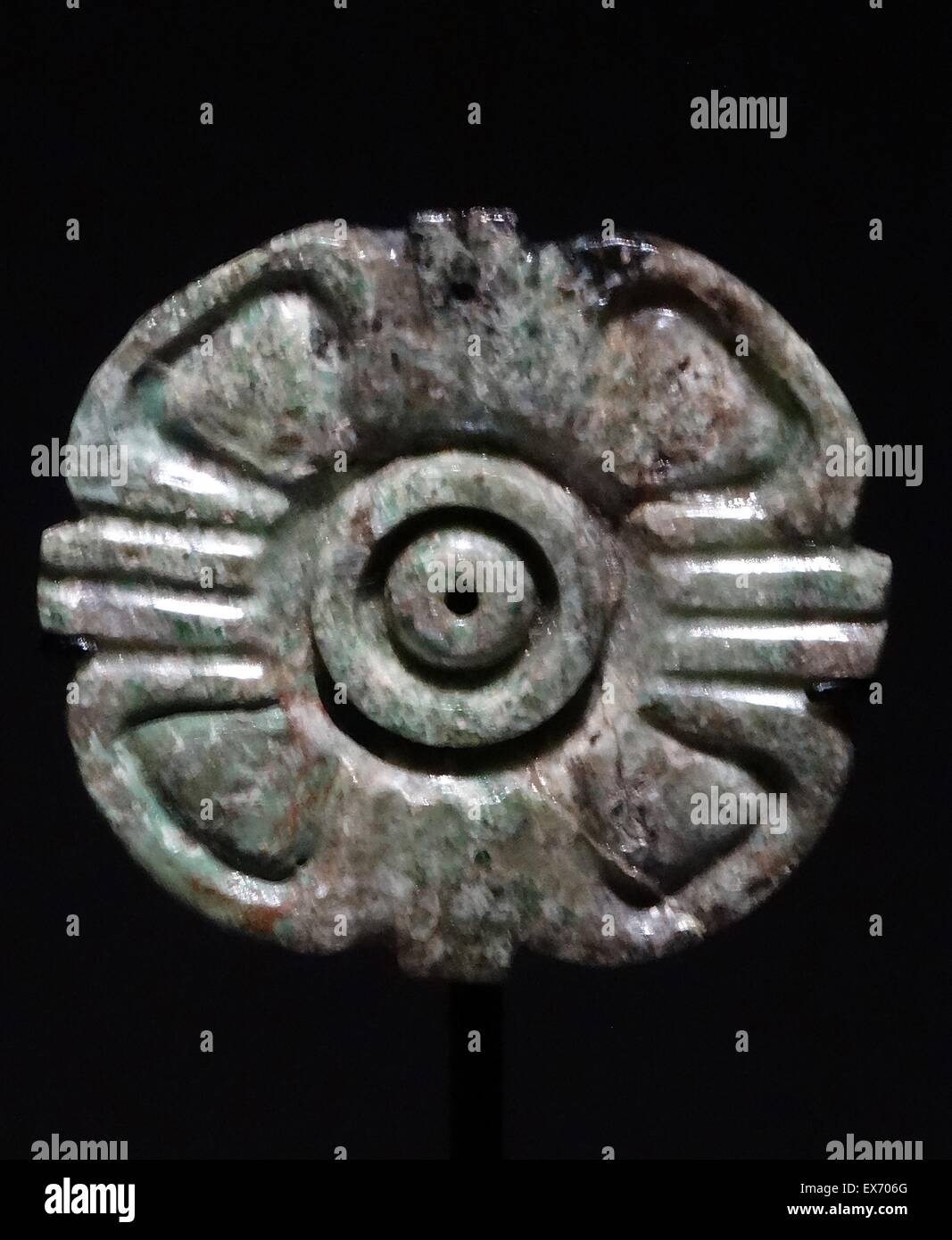 Mayan, jade ornament in the form of a flower. From Chichen Itza ...