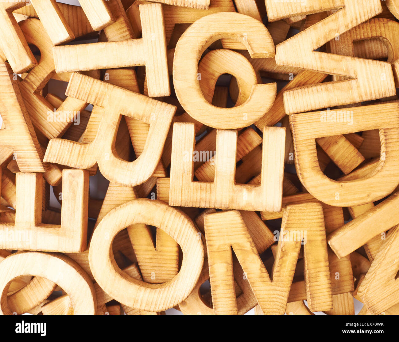 Surface covered with multiple wooden letters Stock Photo - Alamy