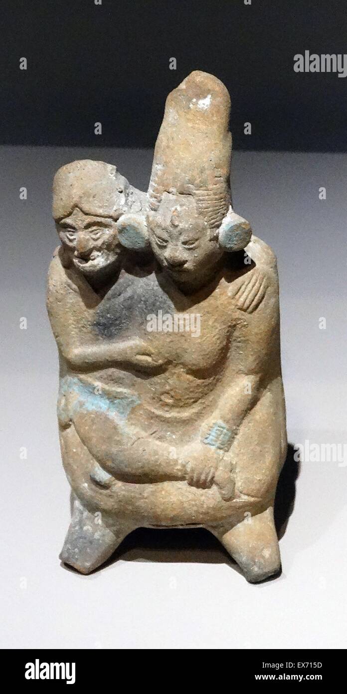 Mayan ceramic figurine of a young woman in the embrace of an old man ...