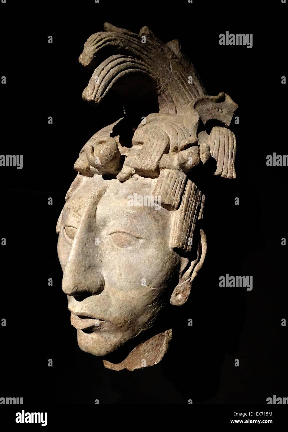 Mayan stucco head of a youth. From a funerary chamber at the Temple of ...