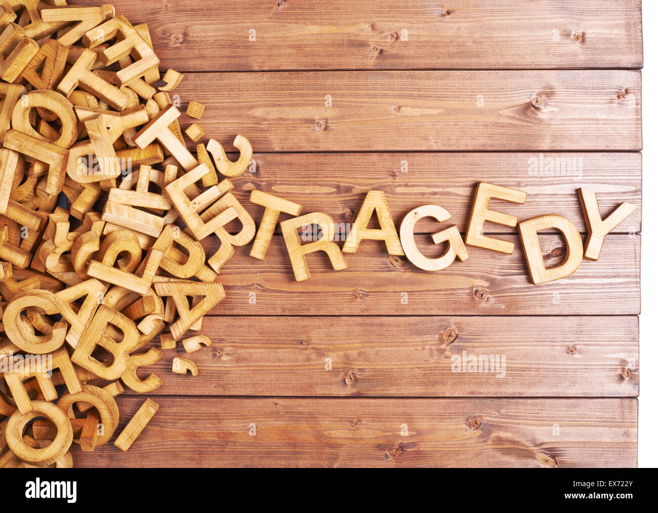 Word tragedy made with wooden letters Stock Photo - Alamy