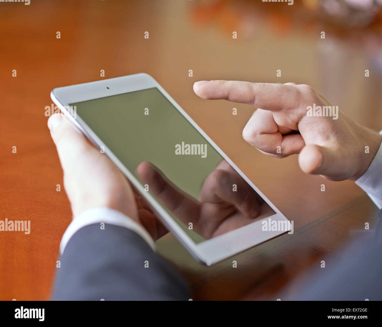 Man working with the tablet Stock Photo - Alamy