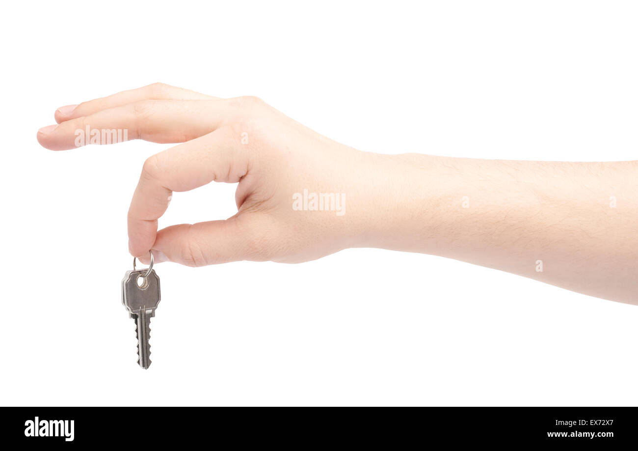 Hand holding a small key Stock Photo - Alamy