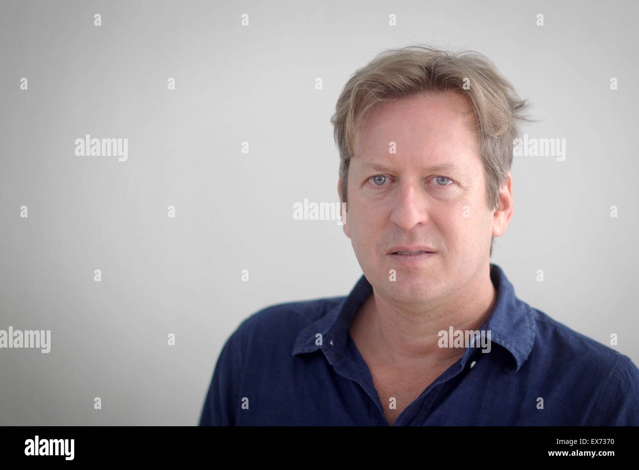 Frankfurt, Germany. 8th July, 2015. US artist Doug Aitken smiles as he ...