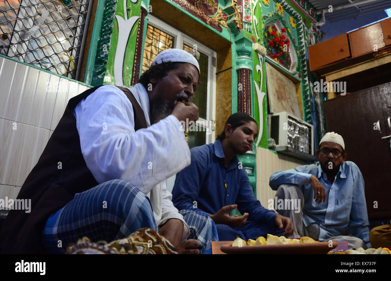 Indian Muslims break their day long fast during Ramadan month at a ...