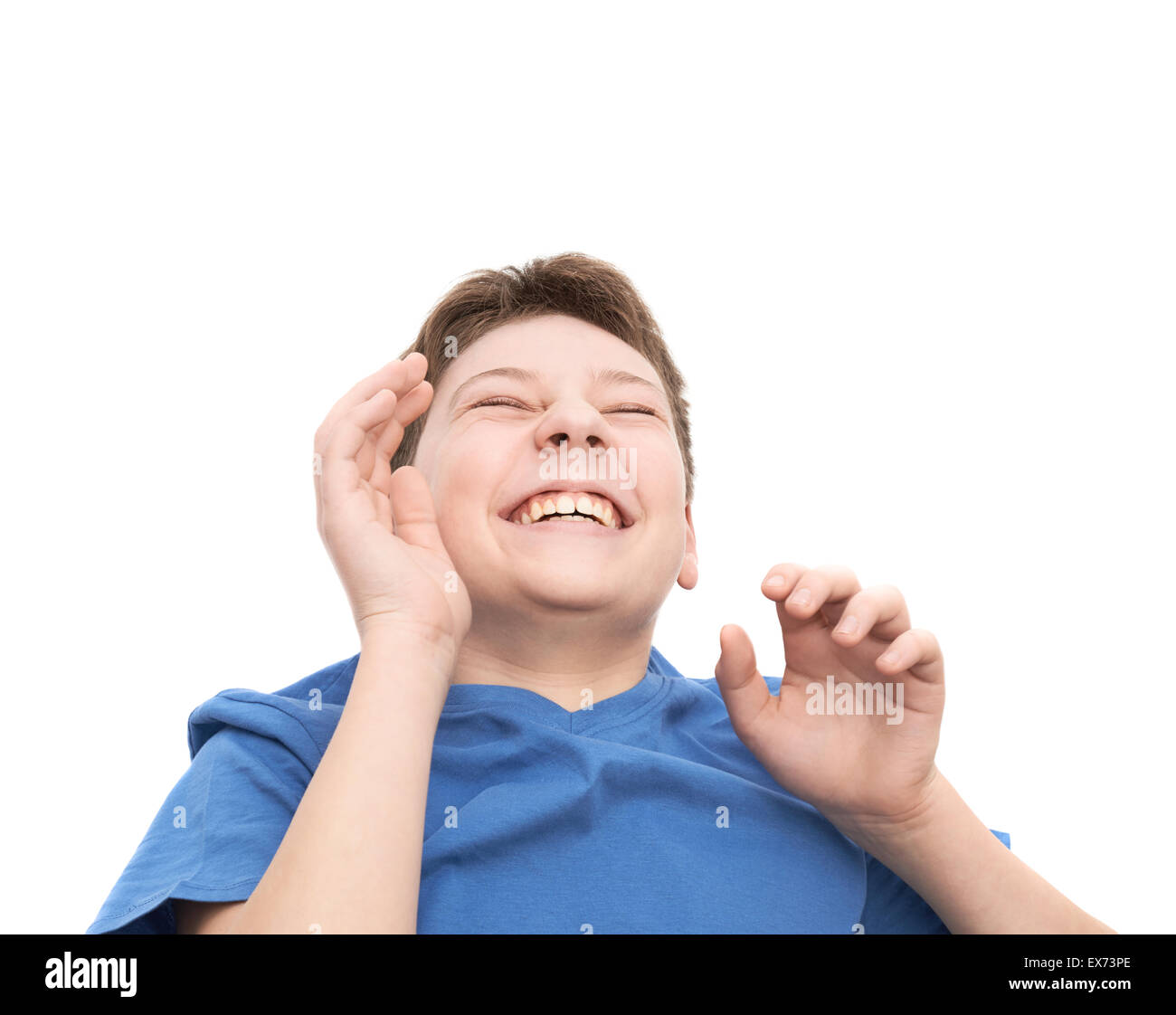 Laughing hysterically young boy isolated Stock Photo - Alamy