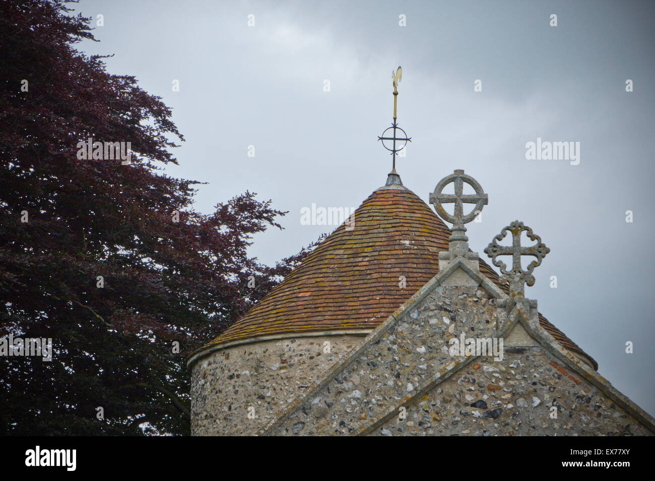 Freethorpe Church flint round tower Stock Photo - Alamy