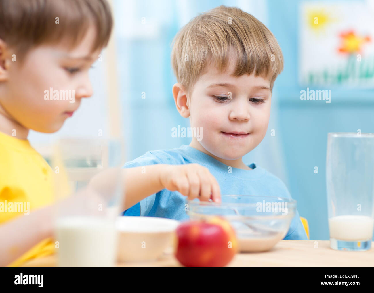 children eat healthy food at home or kindergarten Stock Photo - Alamy