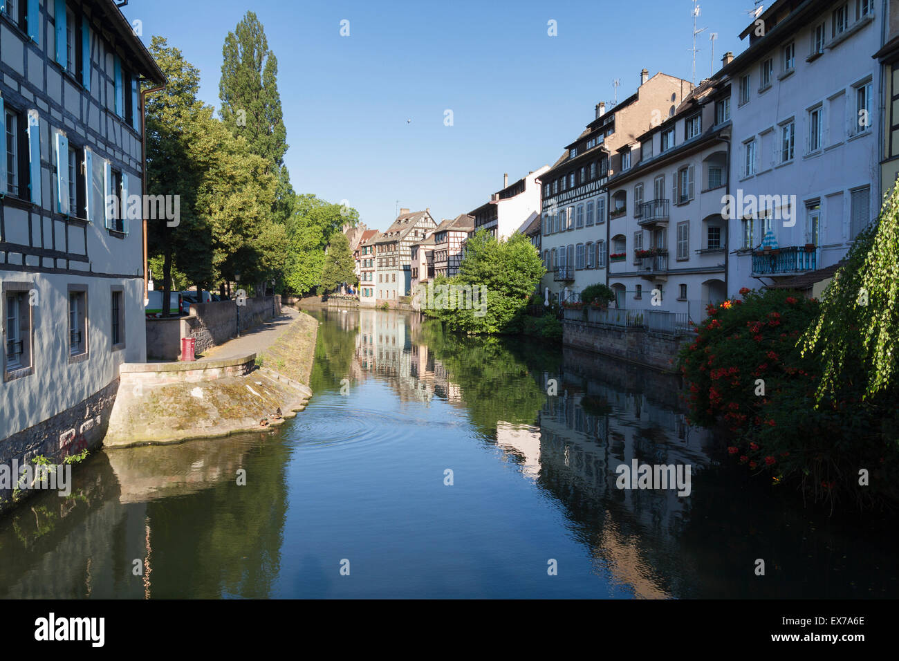 Early morning view of riverside buildings in the Petite France district ...