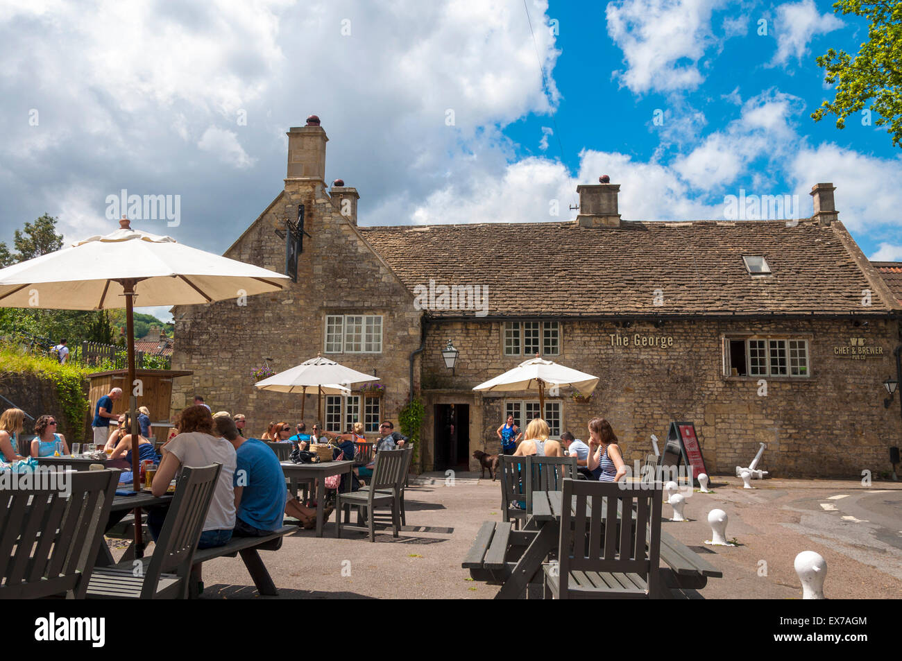 People enjoying a drink outside The George pub in Bathampton, Bath ...