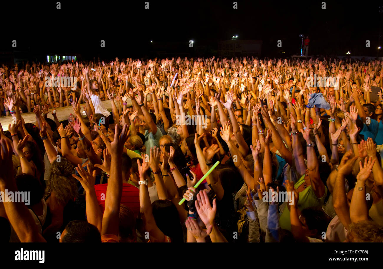 Stelios Rokkos Pop singer fans crowds clapping and raising their hands ...