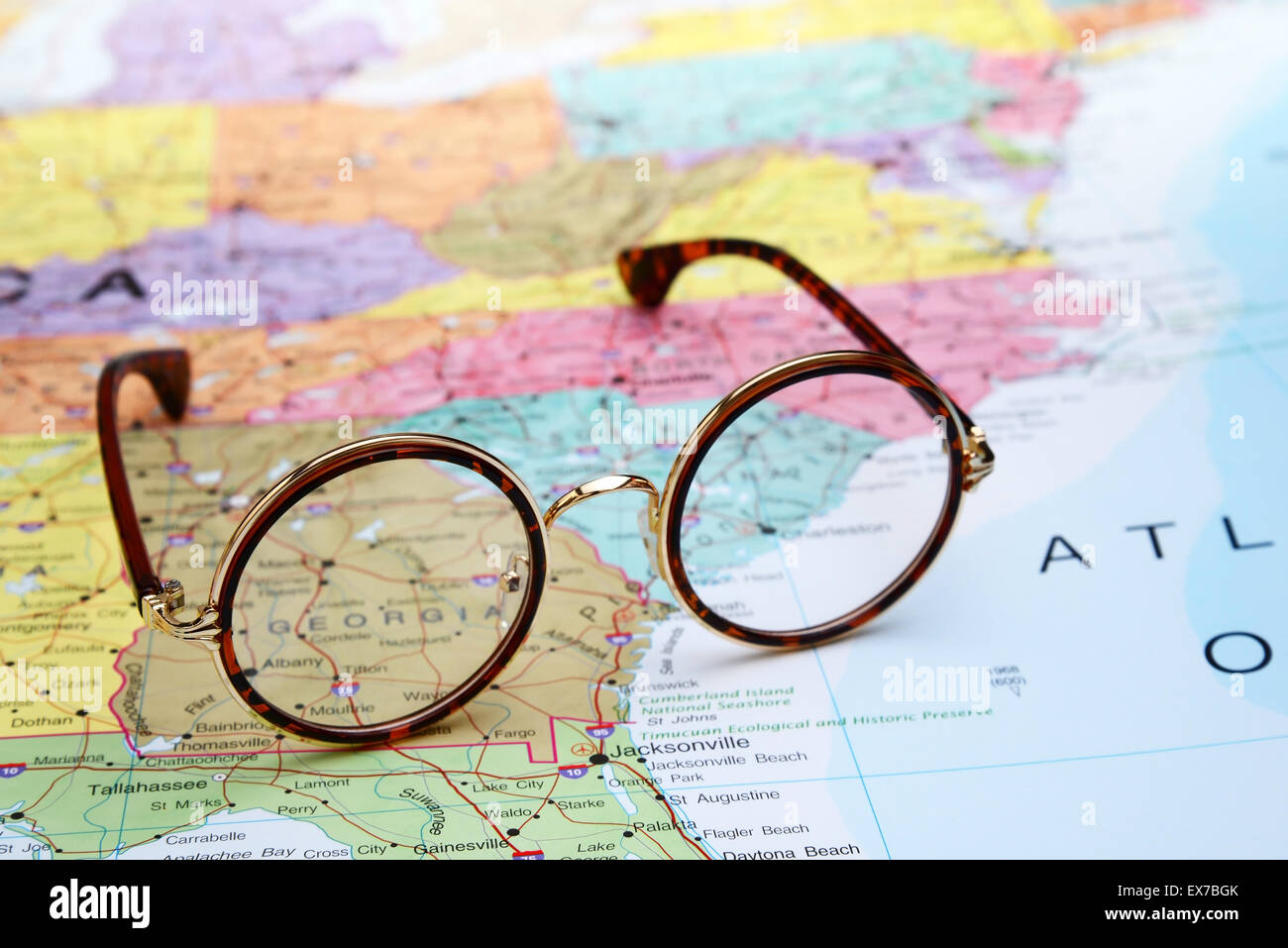 Glasses on a map of USA - Georgia Stock Photo - Alamy