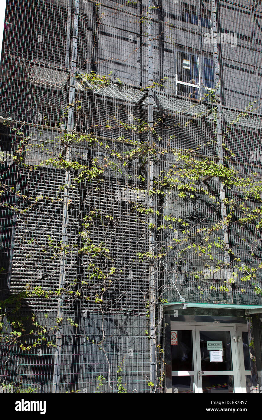Poland, Warsaw, Marszalkowska, Wire frame on building facade to allow ...