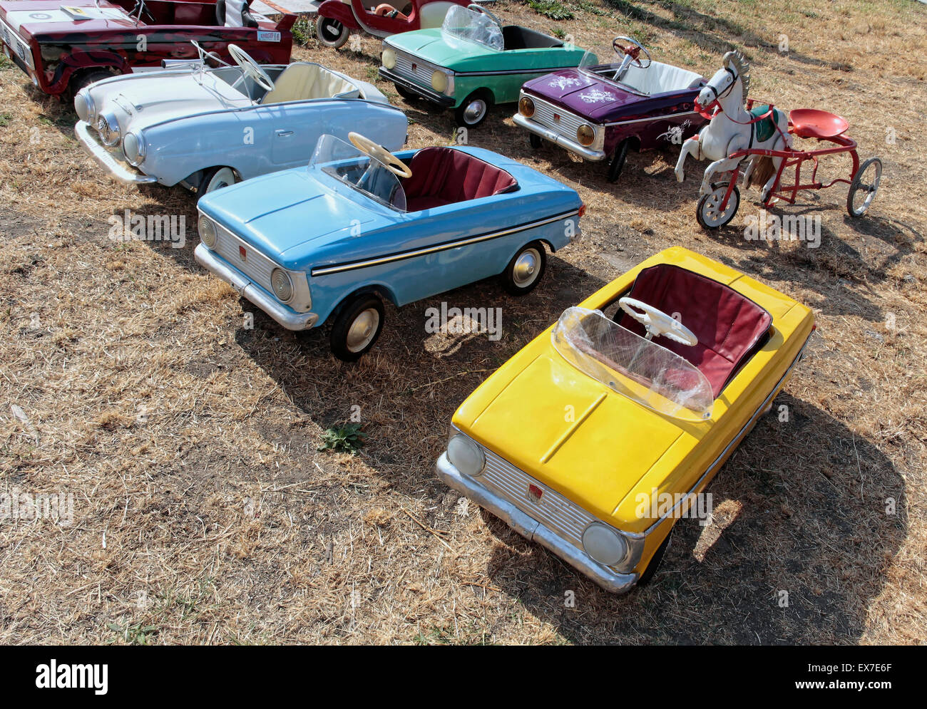 Kids driving small toy cars hi-res stock photography and images - Alamy