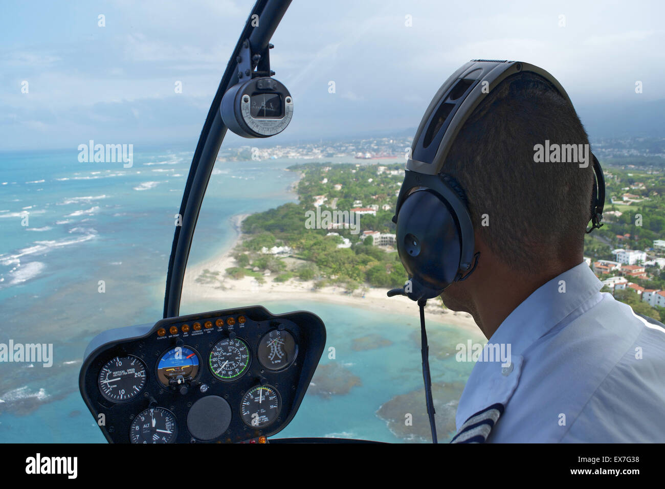 Inside Helicopter, Pilot In Seat Over Tropical Landscape Stock Photo ...