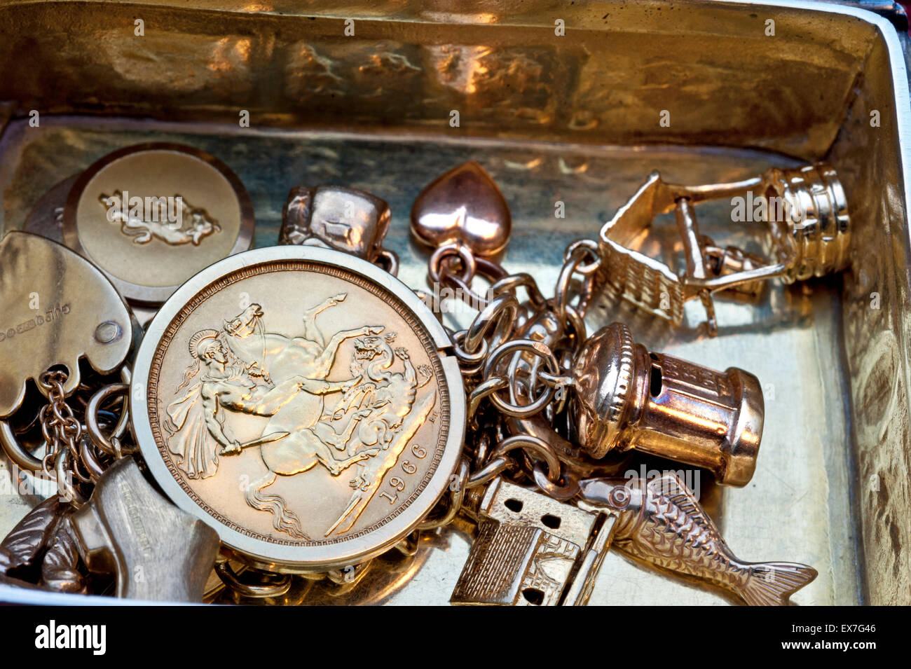 Old unused gold jewelery including a 1966 gold Sovereign in antique ...