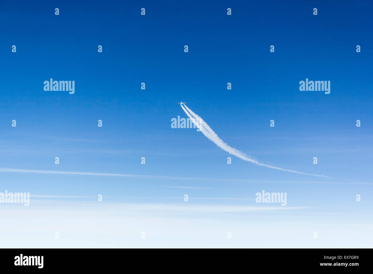 Jet aircraft in flight changing course, landscape format Stock Photo ...