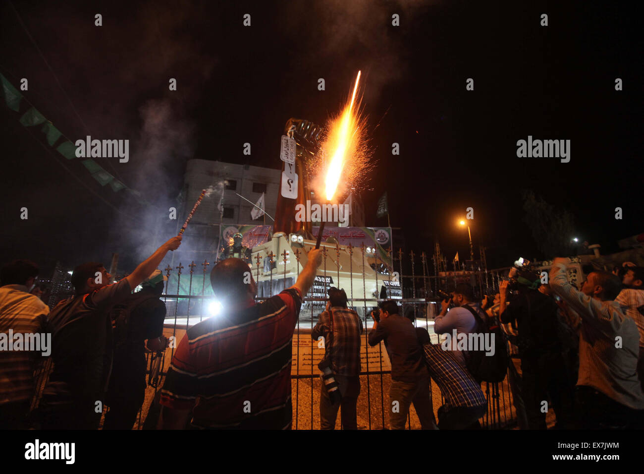 Gaza, Palestine. 08th July, 2015. Palestinians watch as members of ...