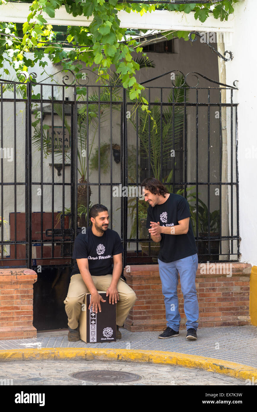 Two flamenco musicians performing in an Andalusian street setting Stock ...