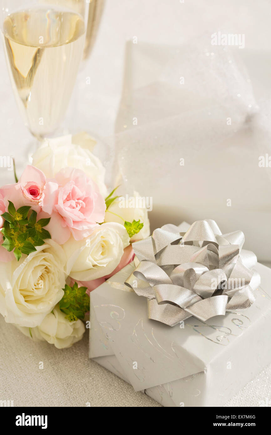 Present and rose bouquet Stock Photo - Alamy