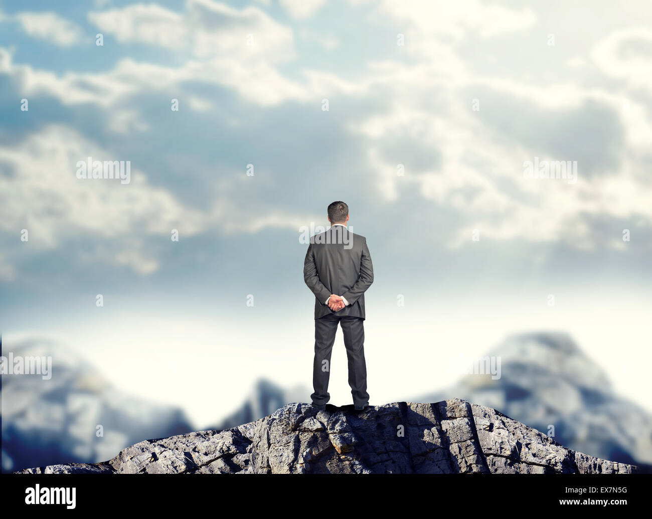 Businessman standing mountain top hi-res stock photography and images ...