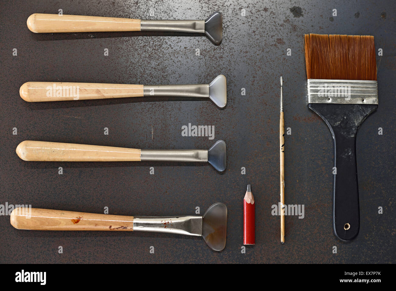 Handcraft tools set on rusty background Stock Photo - Alamy