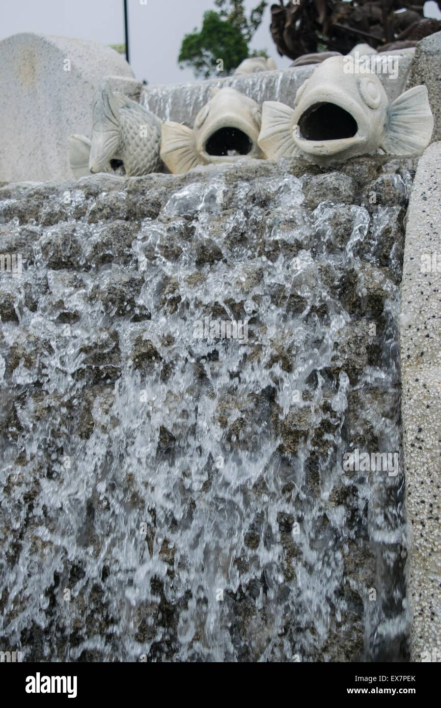 pottery shape fish made for fountain Stock Photo - Alamy