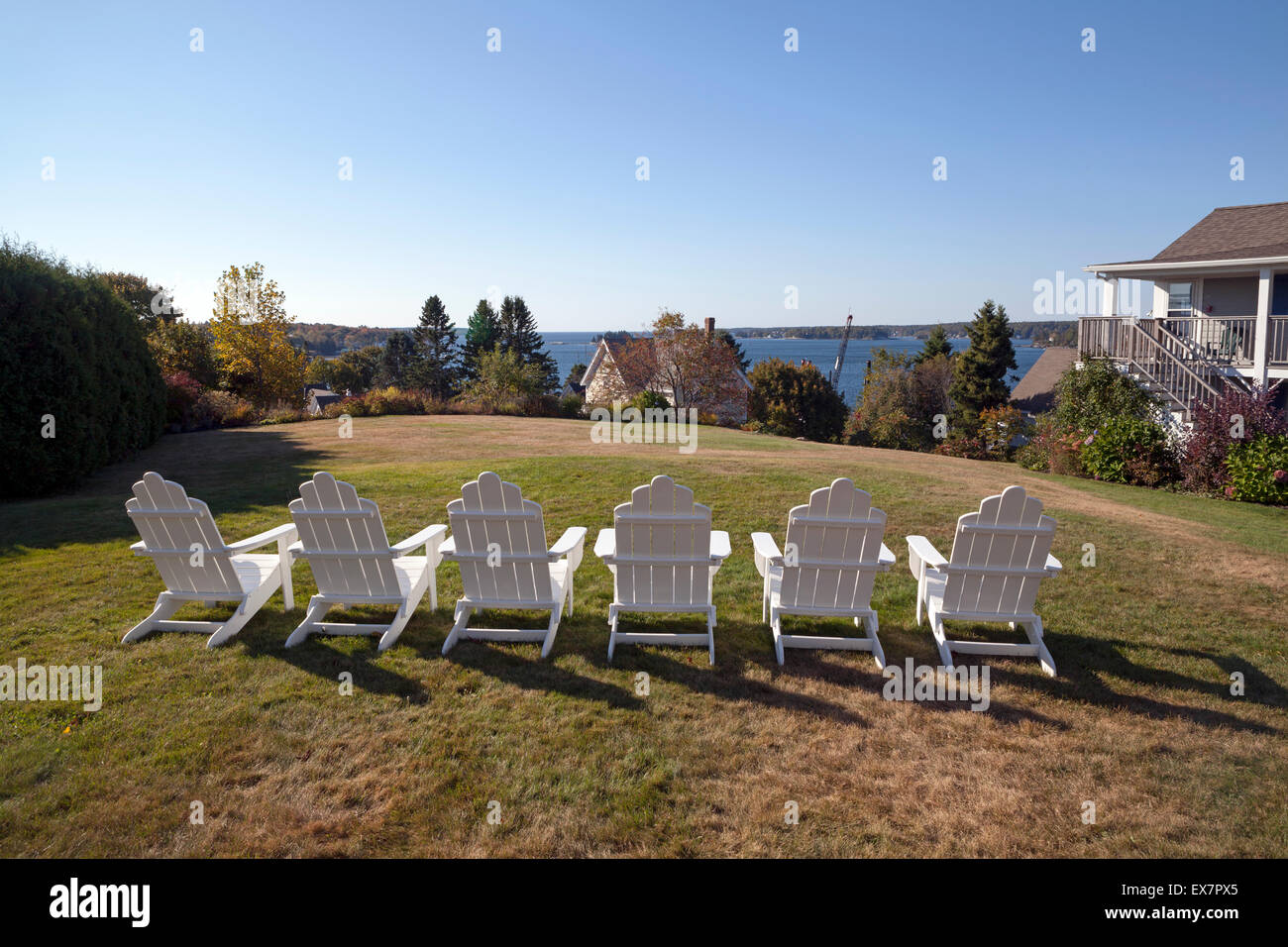 White lawn chairs hi-res stock photography and images - Alamy