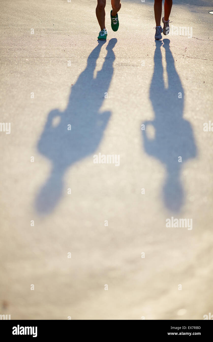 Two pairs of legs hi-res stock photography and images - Alamy