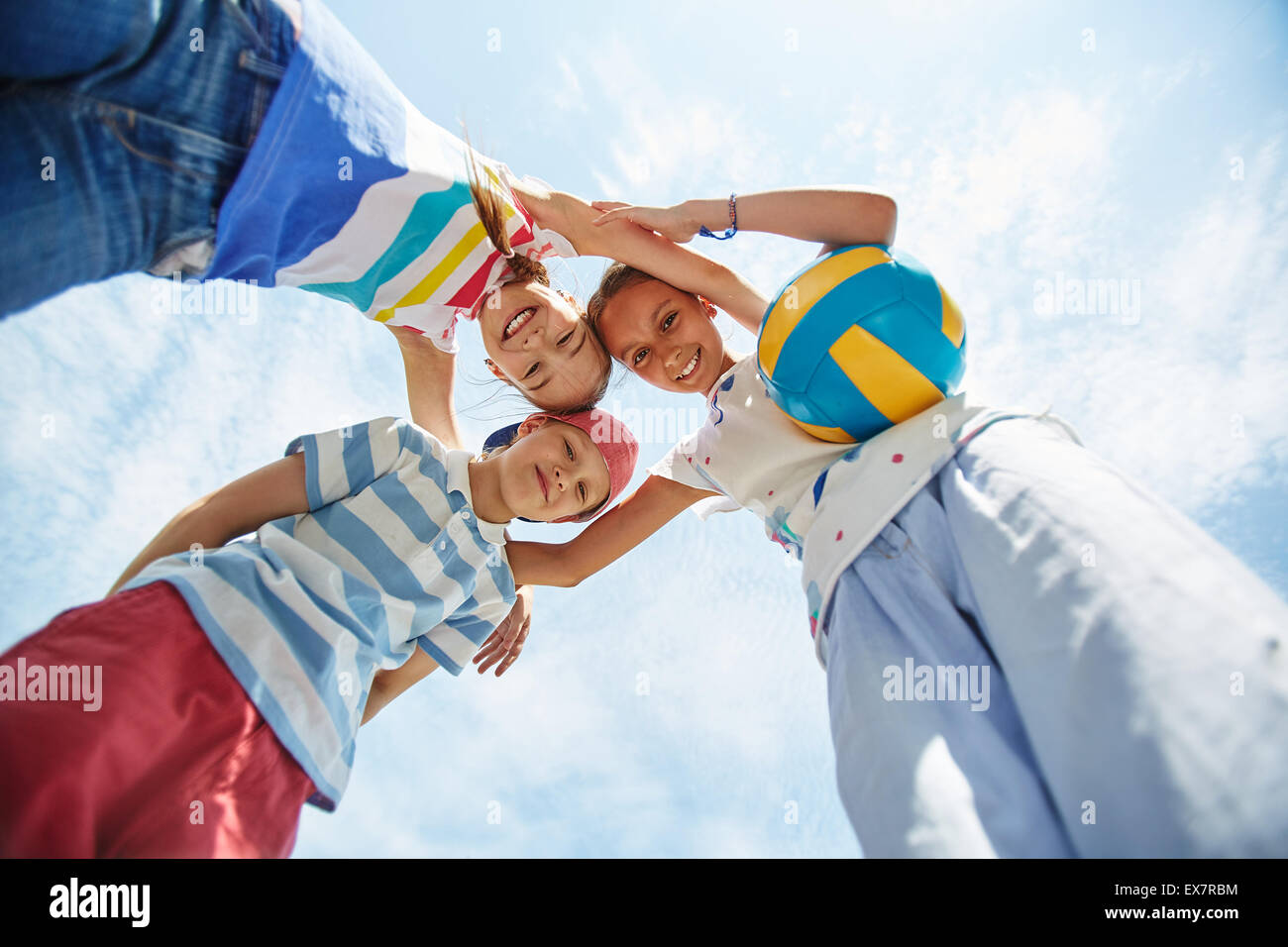 Friendly kids looking at camera outdoors Stock Photo - Alamy