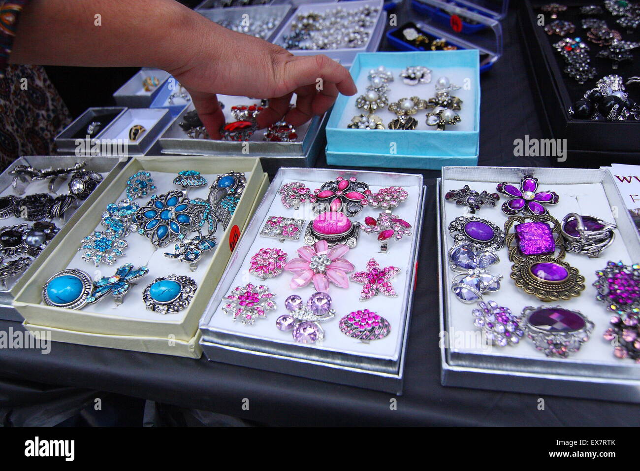 Colorful jeweleries and Rings on display at market stall Stock Photo ...