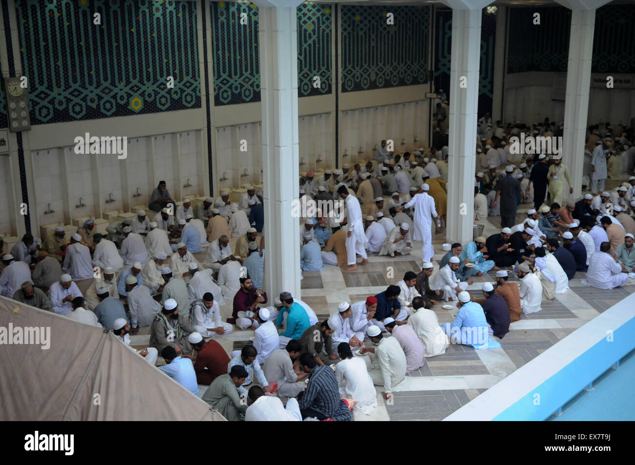 Islamabad, Pakistan. 8th July, 2015. Pakistani Muslims break their fast ...