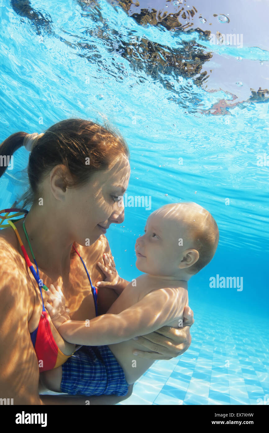 Woman diving pool villa hi-res stock photography and images - Alamy
