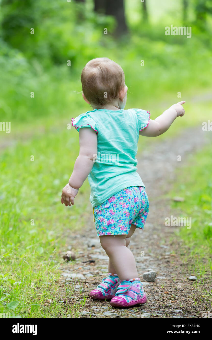 Girl Walking Away Looking Back