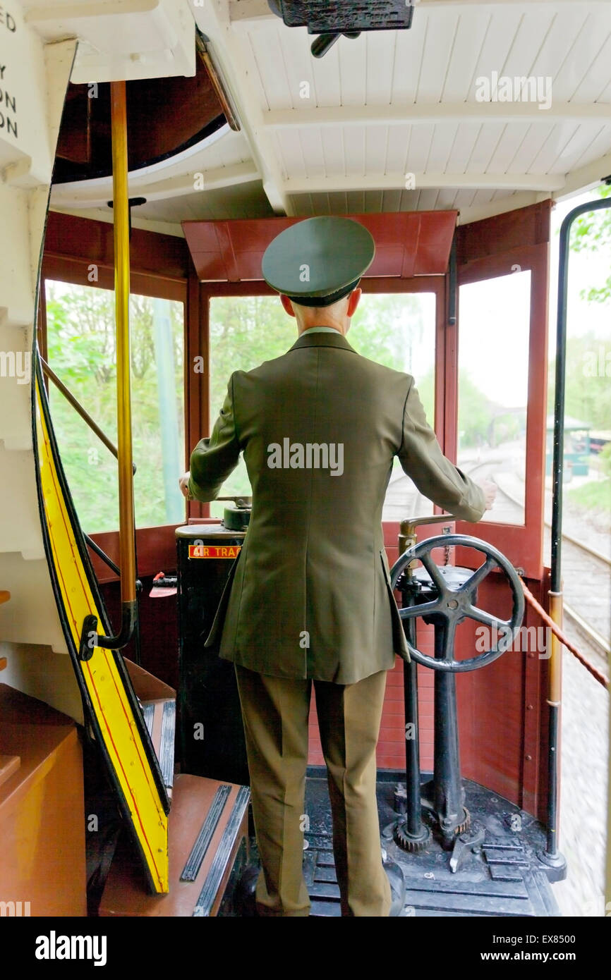 The driver of a Leeds tram from 1926 at the National Tramway Museum ...