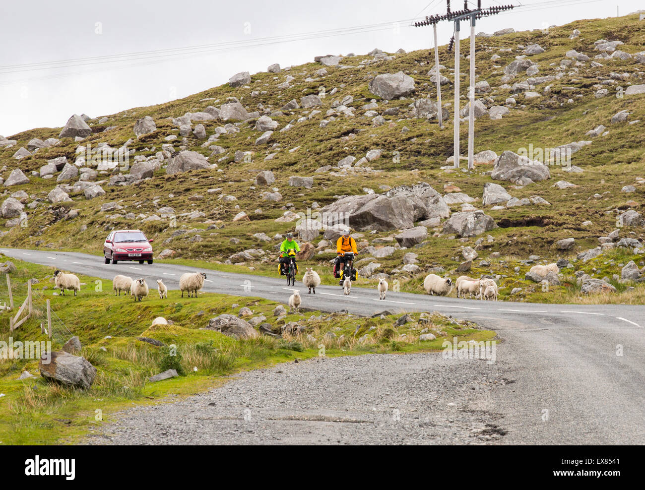 A couple cycle touring on the Isle of Harris, Outer Hebrides, Scotland ...