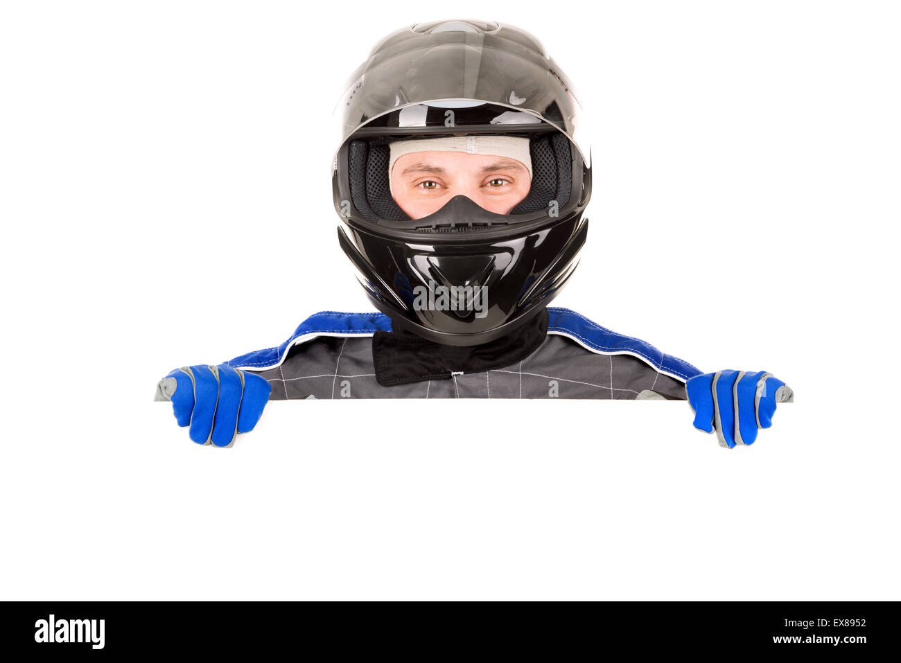 Racing driver posing with white board isolated in white Stock Photo - Alamy