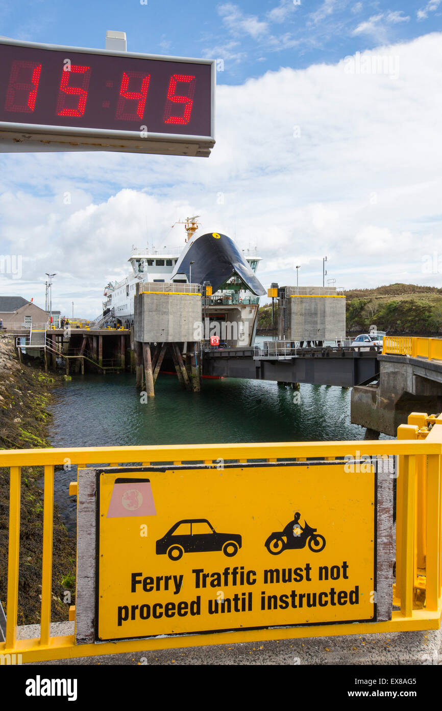 Vehicles disembarking from the Caledonian MacBrayne ferry in Tarbert on ...