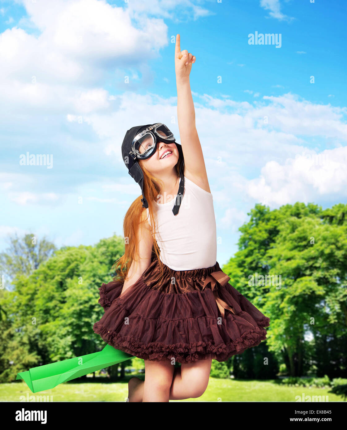 Adorable young girl as a little pilot Stock Photo - Alamy