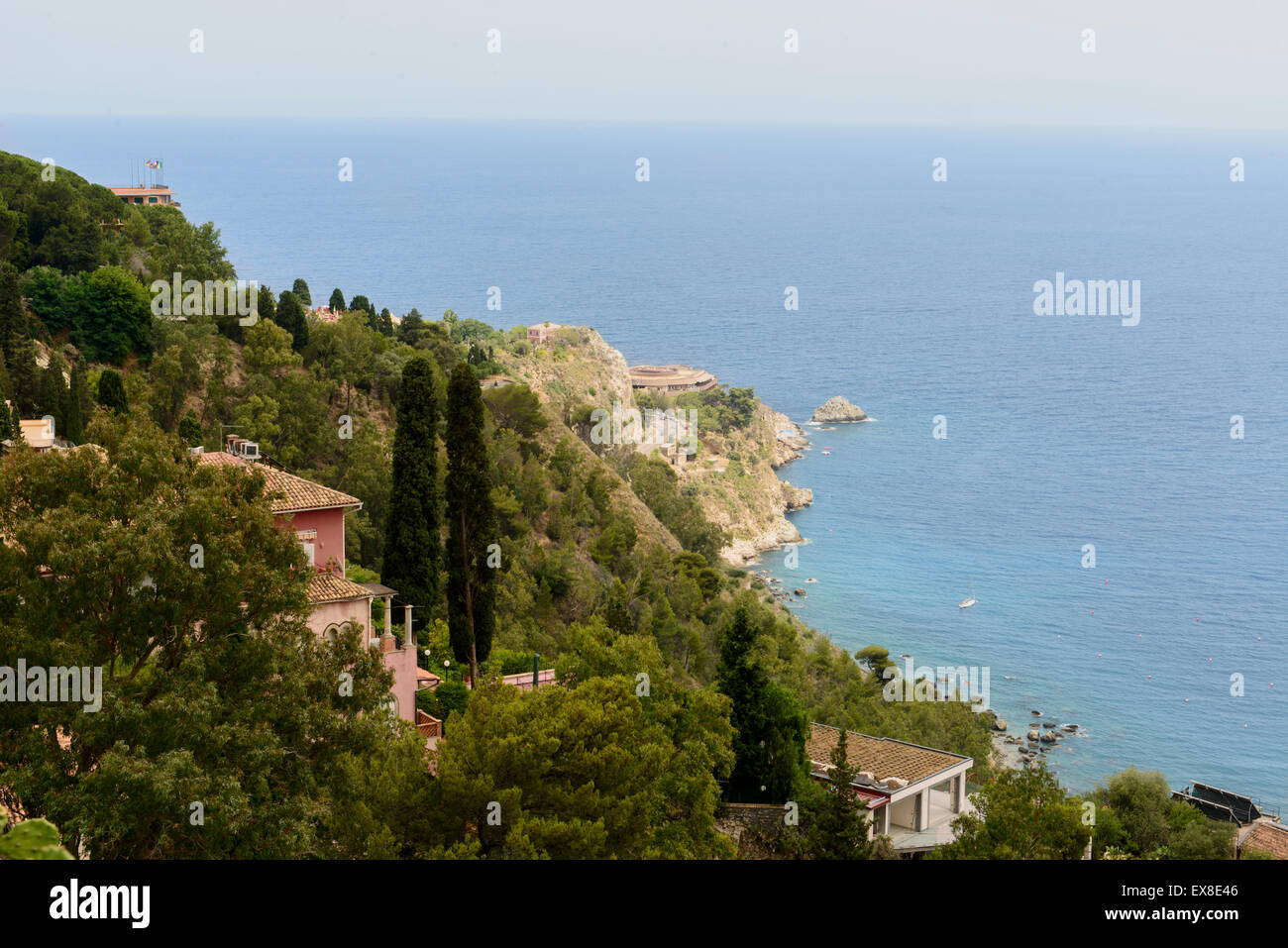 Cliff side overlooking Strait of Messina Taormina, Sicily Stock Photo ...