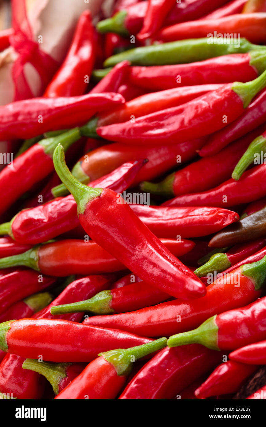 Background of ripe red chili peppers Stock Photo - Alamy