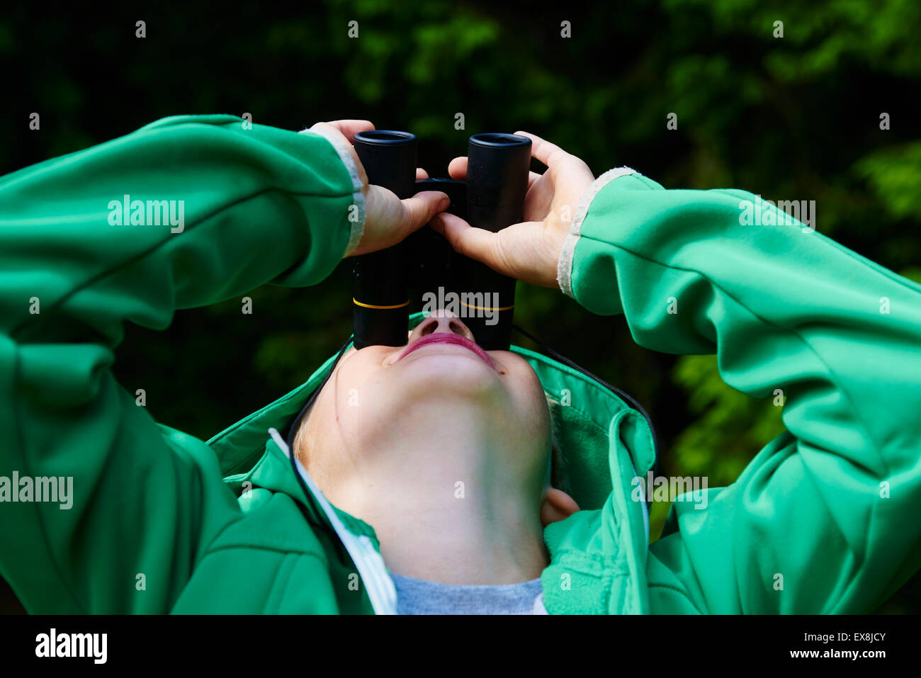 Child boy using binoculars at forest Stock Photo - Alamy